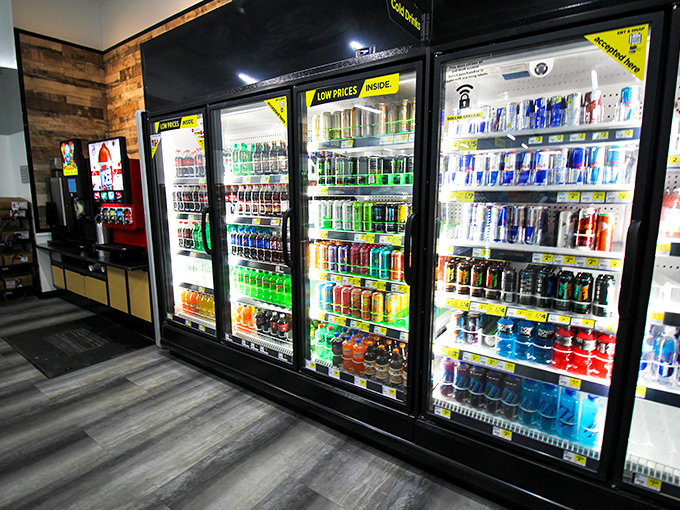 The beverage coolers – a rainbow of hydration options that somehow makes choosing between blue and green drinks feel like life's biggest decision.