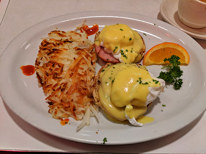 Eggs Benedict: where hollandaise sauce flows like liquid gold and English muffins finally get the respect they deserve.
