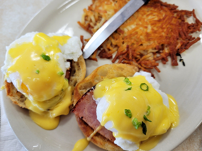 Eggs Benedict that would make a Manhattan brunch spot blush with envy, complete with perfectly crispy hash browns that shatter with each bite.