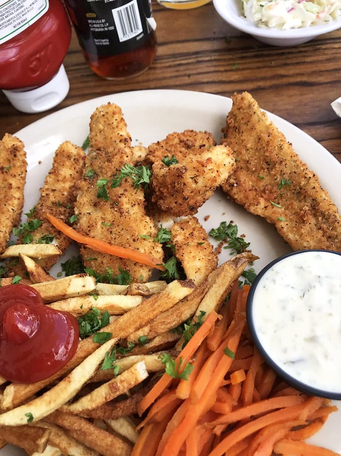 Golden-crusted perch that shatters with each bite, paired with hand-cut fries&mdash;proof that simplicity, when done right, is culinary poetry.
