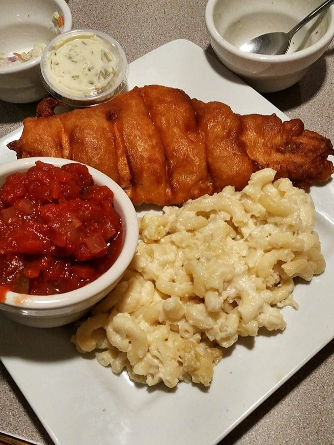 Golden-battered fish that shatters at first bite, nestled beside creamy mac and cheese &ndash; comfort food that speaks Pennsylvania's language fluently.