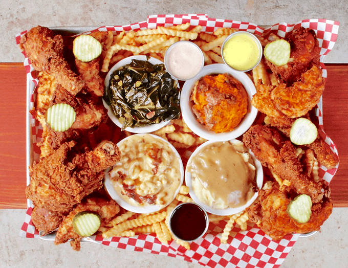 The family-style feast that turns strangers into friends and friends into people who owe each other napkins. Southern hospitality on a platter.