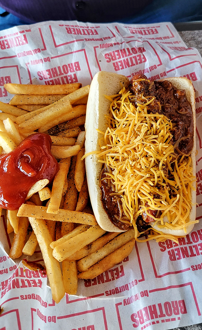 This hot dog, crowned with a mountain of cheese, makes a compelling case that happiness can indeed be purchased for the price of lunch.