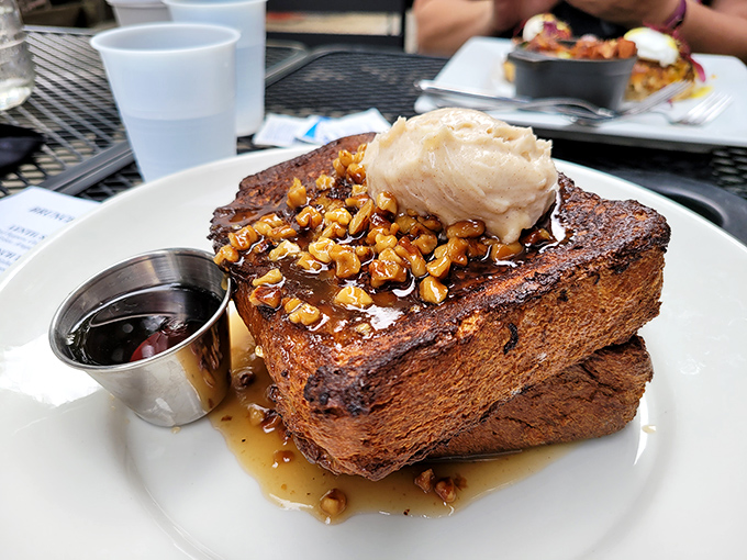 French toast so decadent it should require a permission slip. Thick-cut, caramelized to perfection, and topped with what can only be described as breakfast bliss.