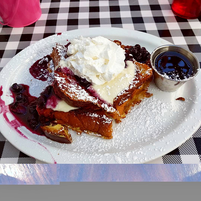 French toast elevated to art form, complete with berry compote that would make your grandmother weep. 