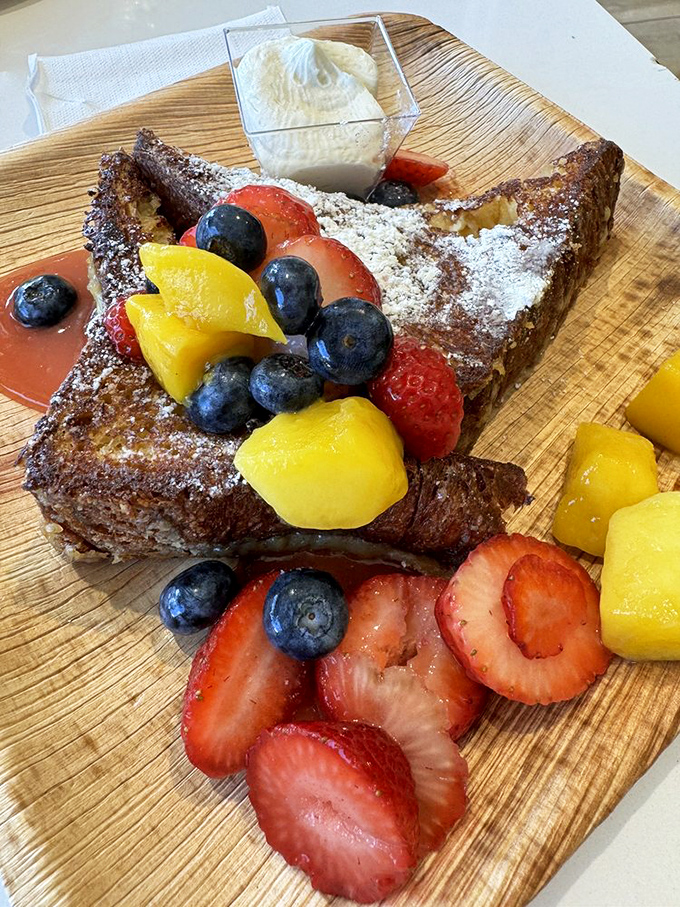 This French toast isn't messing around&mdash;it's arrived with a fruit entourage that makes regular breakfast feel like it needs to step up its game.