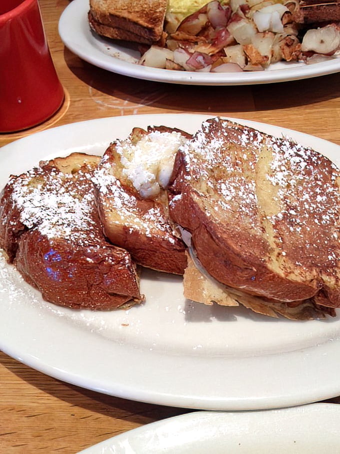This French toast isn't just breakfast; it's a powdered-sugar dusted revelation that makes Monday mornings bearable again.