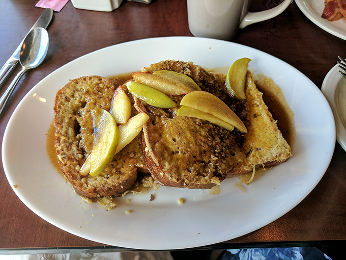 French toast that makes you question why you'd ever eat anything else for breakfast. Those caramelized apples aren't just toppings&mdash;they're game changers.
