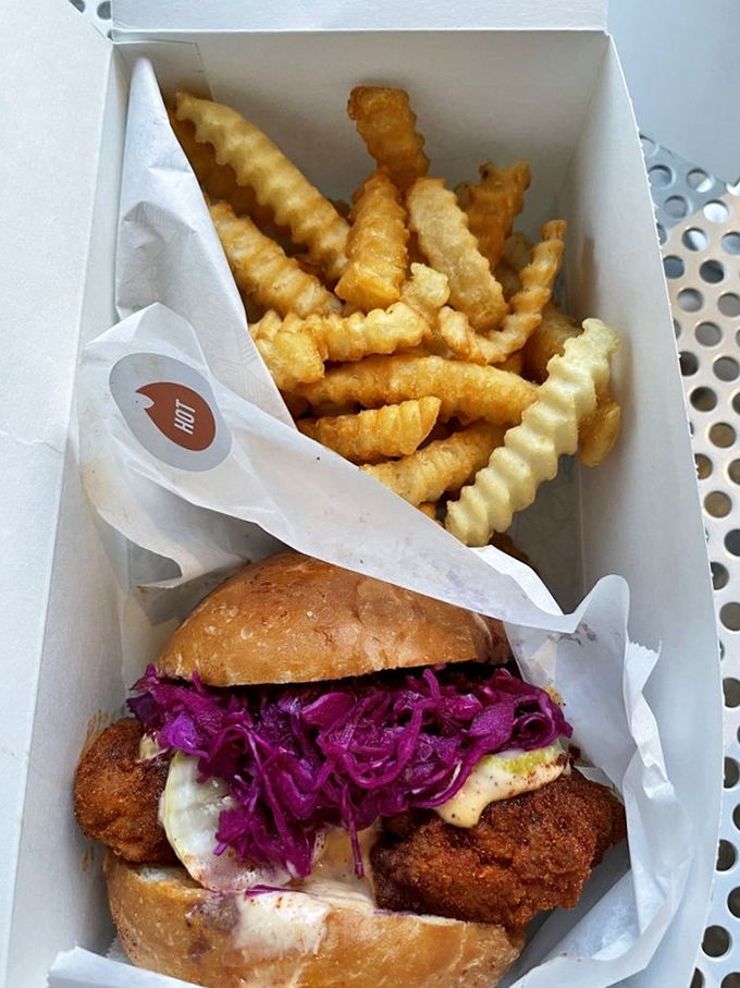 The complete experience: golden-brown sandwich perfection paired with those ridiculously addictive crinkle-cut fries. Resistance is futile.