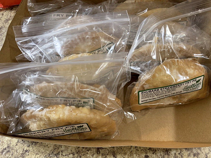 These hand-held fried pies are like time machines to your grandmother's kitchen, with flaky crusts barely containing their fruit fillings&mdash;the perfect road trip companion.