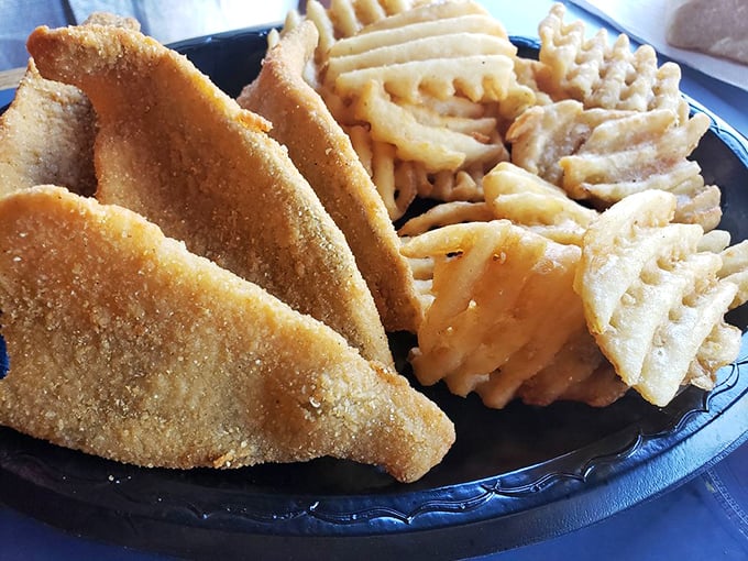 Walleye and waffle fries: a Great Lakes duo that belongs together like Bogart and Bacall, crispy outside and tender within.
