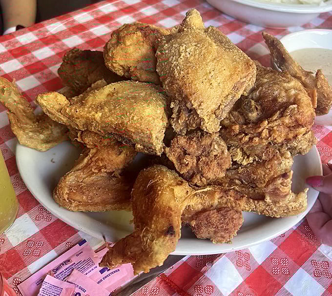 Behold the golden battalion of crispy, juicy perfection. This isn't just fried chicken&mdash;it's edible history on a plate.
