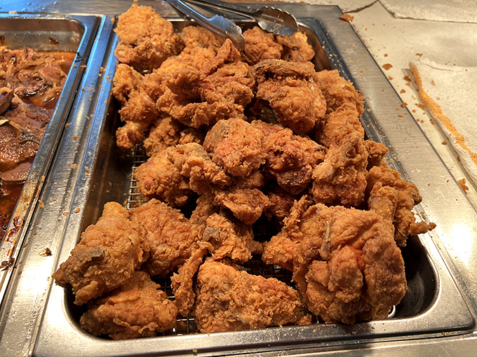 Fried chicken that's achieved crispy perfection—the kind that makes you wonder if your grandmother secretly moonlights in their kitchen.