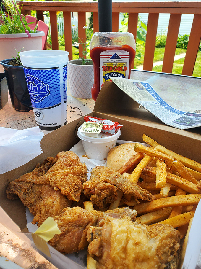 Enjoying Rooster's outdoors turns an ordinary meal into a Minnesota summer celebration, with that chicken practically glowing in the sunlight.