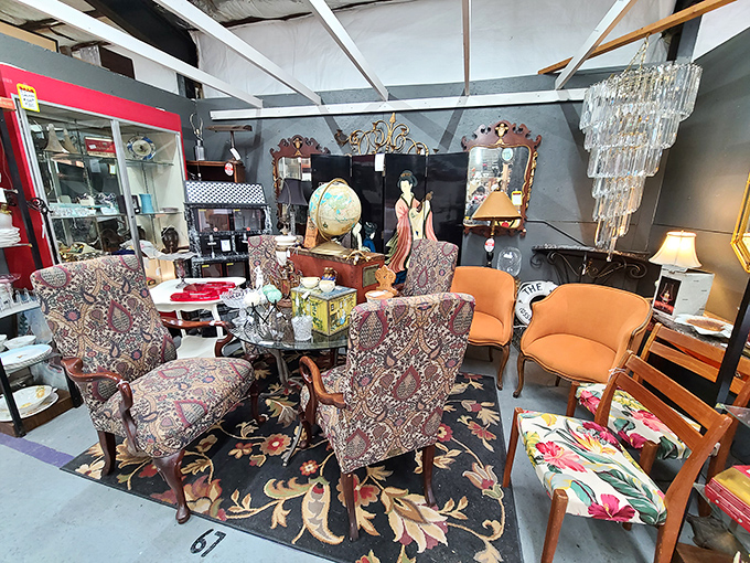 Mid-century meets Victorian in this eclectic furniture display. That patterned upholstery has witnessed more family discussions than a holiday dinner table.