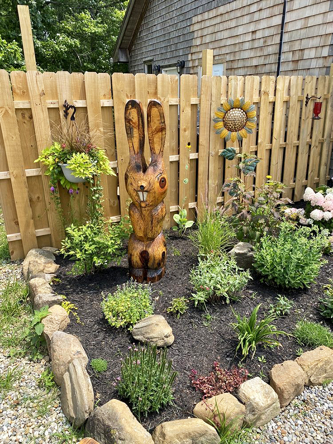 The wooden bunny sculpture standing guard among the garden beds seems to say, "Yes, we're whimsical, and our wines are seriously good."
