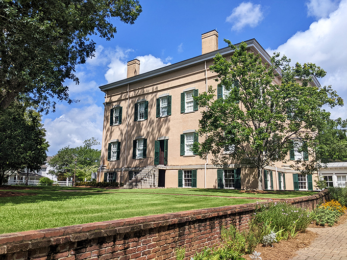 The Old Governor's Mansion stands as Georgia's crown jewel of antebellum architecture, where history whispers from every meticulously preserved corner.