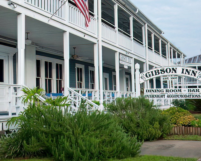 The Gibson Inn's wraparound porch practically begs you to sit a spell, cocktail in hand, watching the world drift by at Old Florida pace.