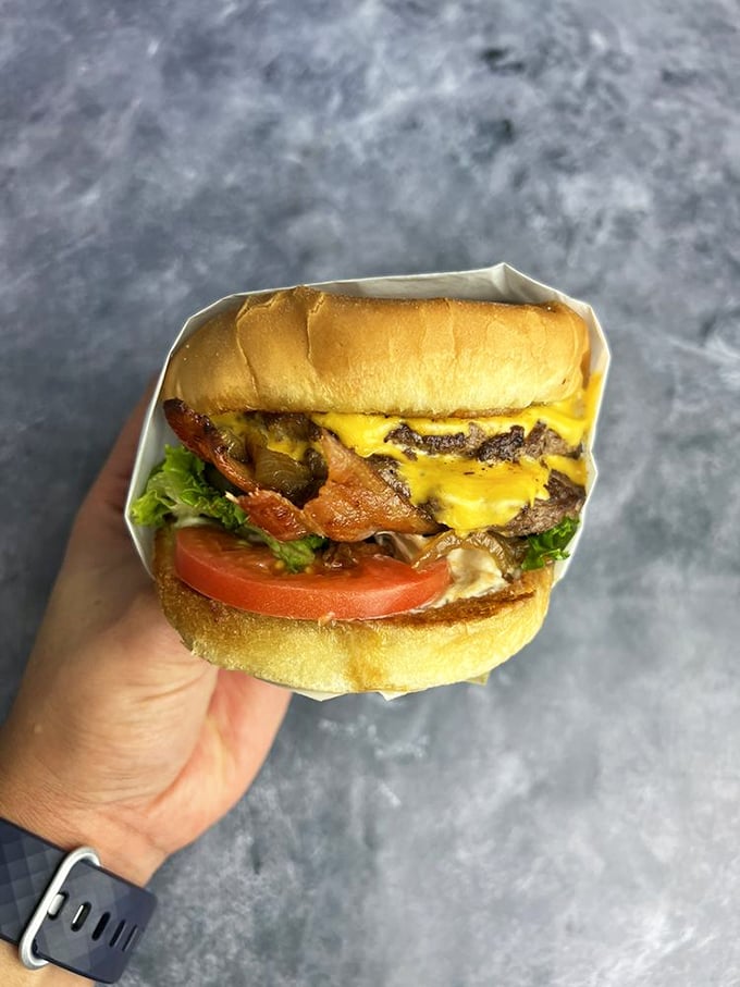 The Grande Royale doesn't just sit there looking pretty&mdash;it practically winks at you with its bacon, melted cheese, and fresh veggies stacked in perfect harmony.