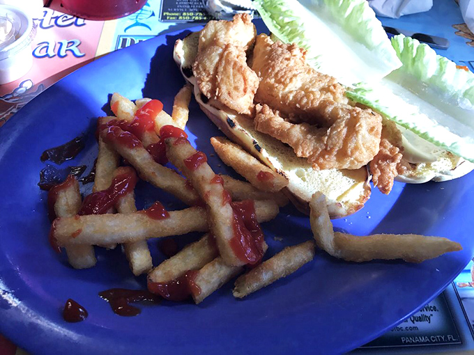 A proper grouper sandwich should require both hands and make you forget your table manners. This one passes the test with flying colors.