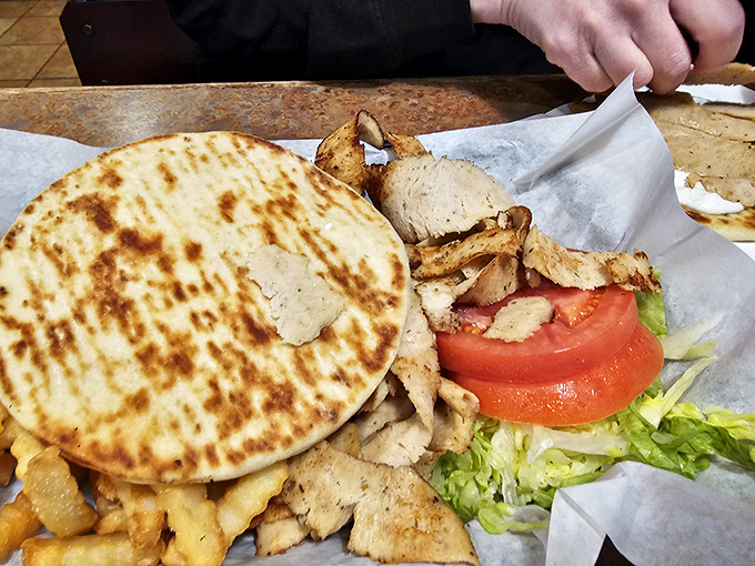 The gyro &ndash; where Mediterranean meets Midwest in a handheld testament to cultural harmony that tastes way better than world peace sounds.