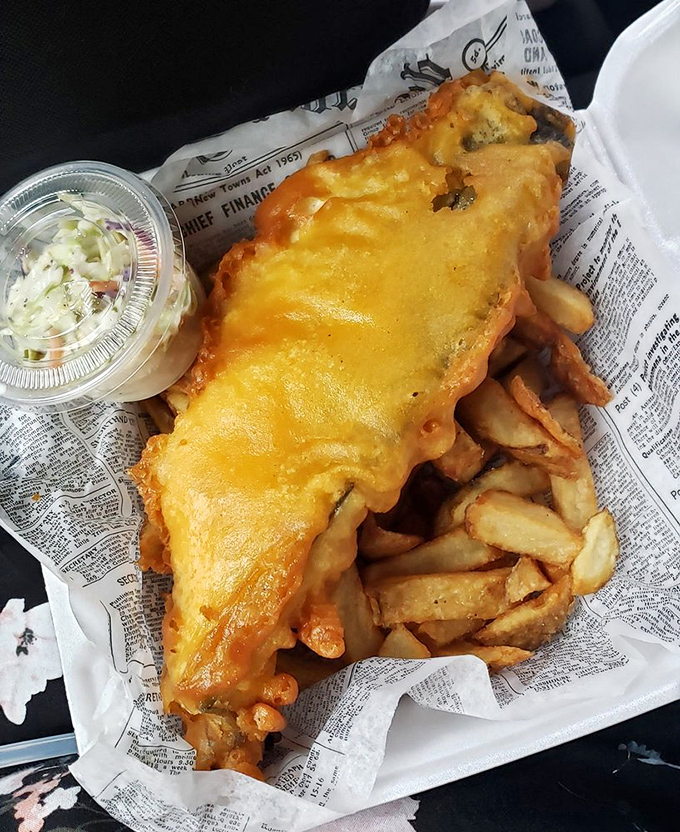 This haddock filet wears its golden beer batter like a royal robe. One bite and you'll understand why the British consider this a national treasure.