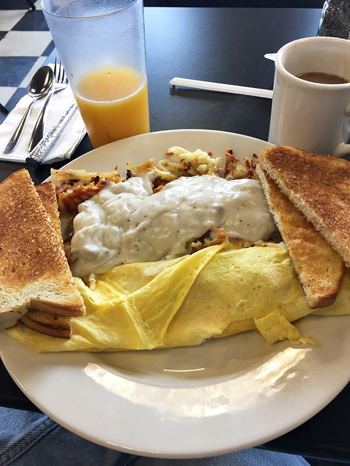 The breakfast omelet that answers the eternal question: "Why choose between hash browns and gravy when you can have both?"