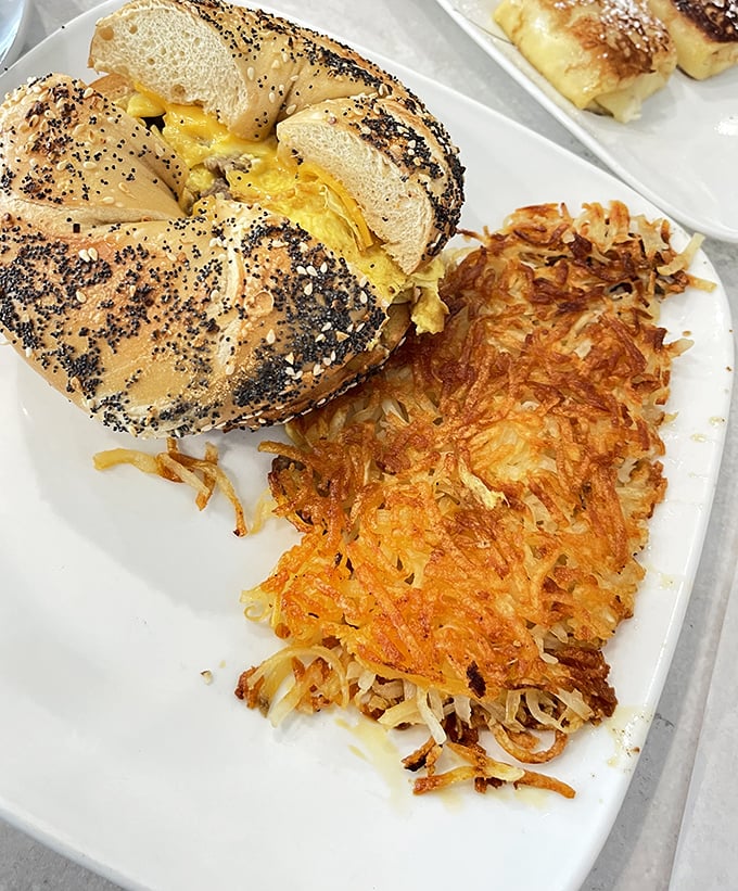 The breakfast sandwich that launched a thousand road trips. Crispy hash browns alongside an everything bagel stuffed with melty egg and cheese.