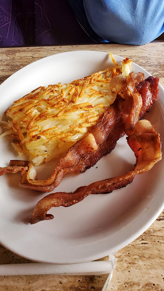 These hash browns have achieved the breakfast trifecta: crispy exterior, tender interior, and the perfect golden hue that says "I was made with love."