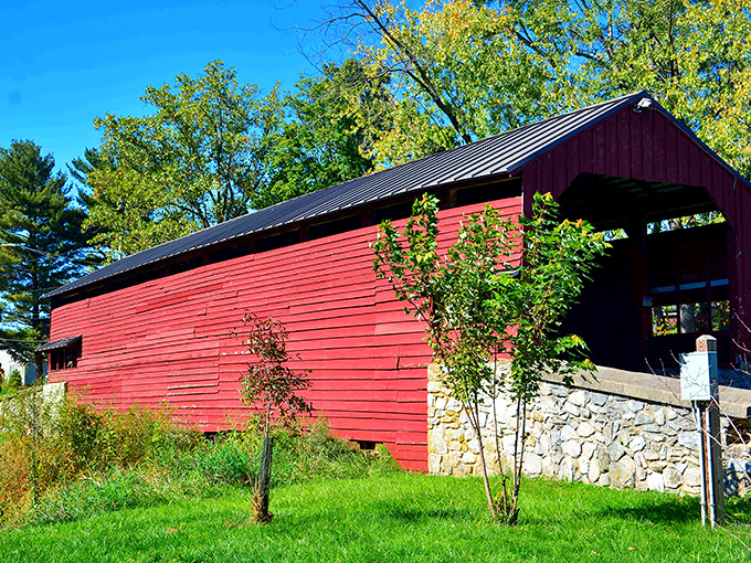Like something from a storybook, this vibrant red covered bridge creates the perfect frame for memories&mdash;and countless "we were here" photos.