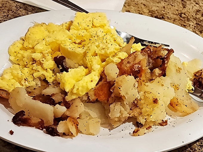 Home fries that achieved the impossible trifecta: crispy edges, tender centers, and seasoning that makes salt and pepper shakers wonder why they bothered showing up. 