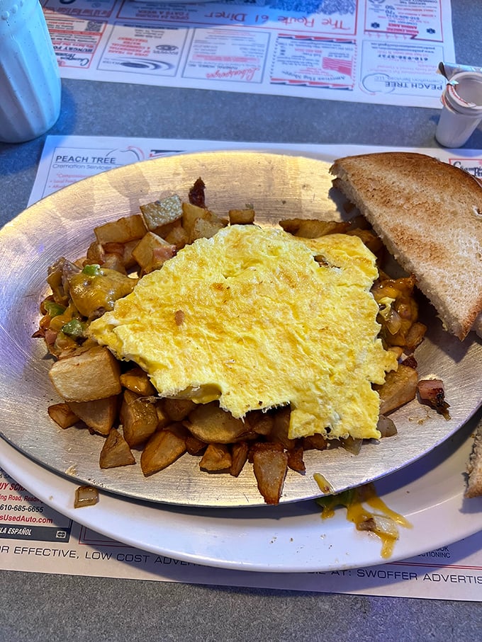The holy trinity of breakfast: perfectly scrambled eggs, golden home fries, and toast. Simple math that somehow always equals joy.