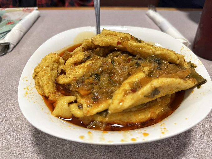 These dumplings aren't floating in sauce&mdash;they're swimming in history, each bite a time machine to grandmother's kitchen.