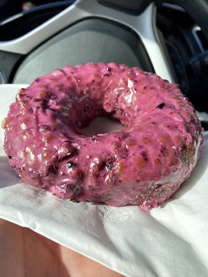 Behold the legendary huckleberry donut in all its purple-pink glory. That vibrant color isn't artificial&mdash;it's berry bliss in circular form.