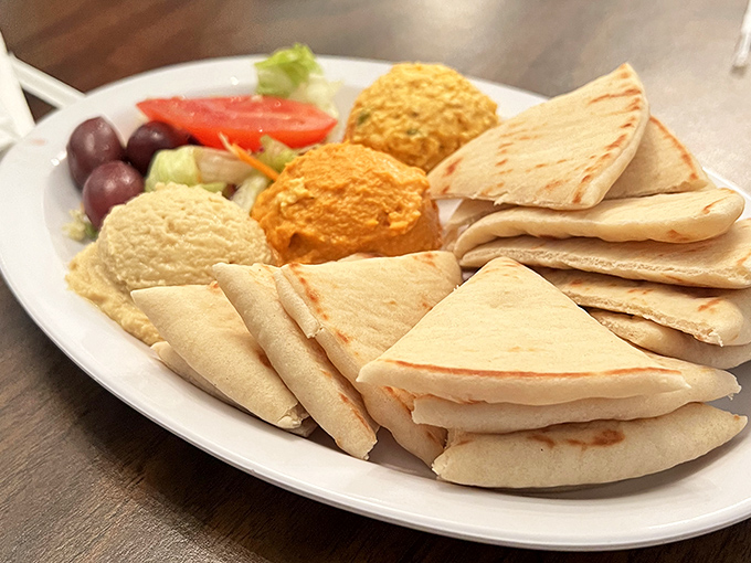 The hummus trio: regular, roasted red pepper, and feta. Like choosing between Beatles albums &ndash; they're all classics for different reasons.