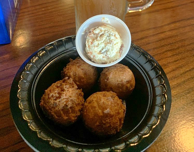 Golden-brown hush puppies with a side of heaven. These cornmeal treasures might be worth the drive to Grant-Valkaria all by themselves.