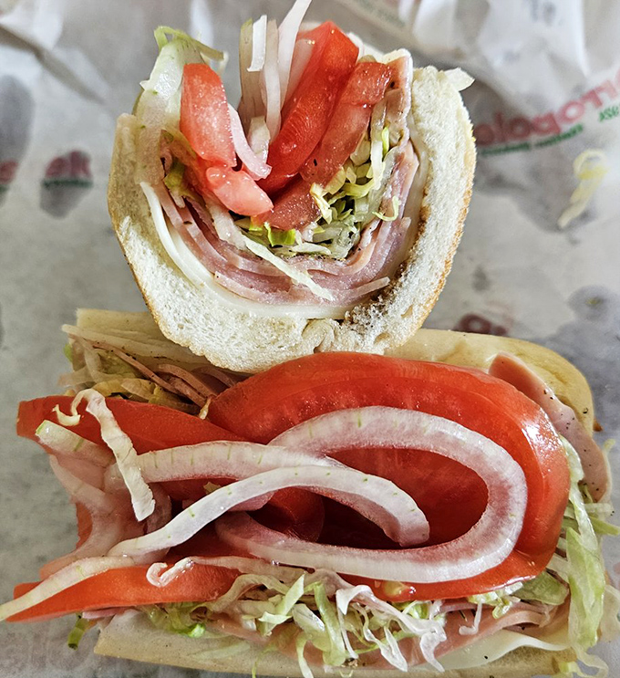 This isn't just a sandwich; it's architectural genius&mdash;layers of Italian meats, crisp vegetables, and that perfect bread creating the hoagie equivalent of the Sistine Chapel.
