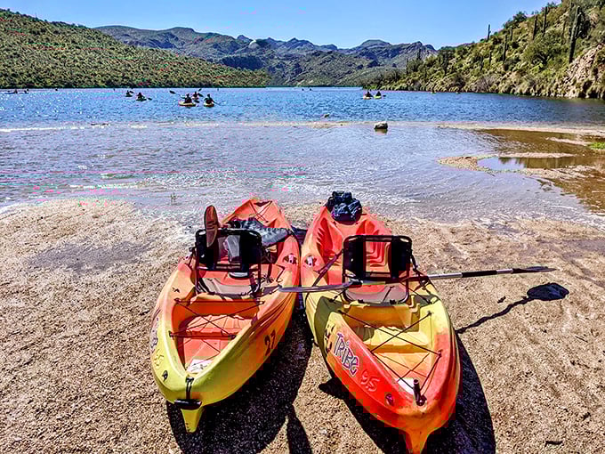 Technicolor kayaks waiting their turn to explore Saguaro Lake's hidden coves. The desert's version of a two-car garage &ndash; just add water.