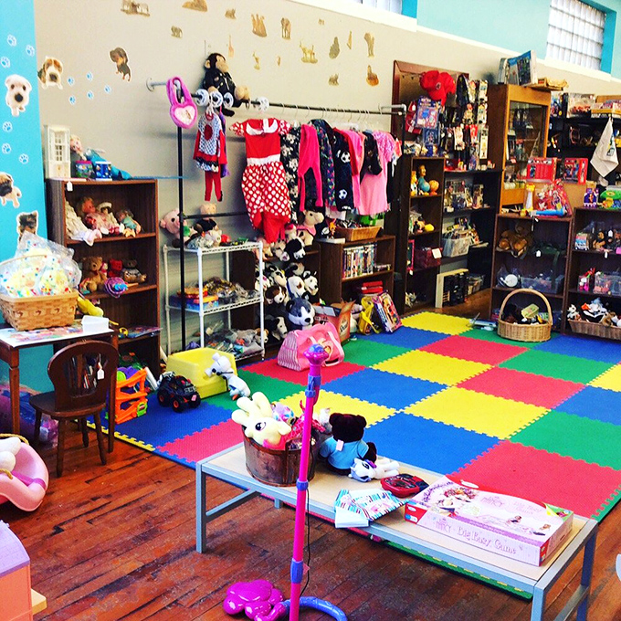 The children's corner bursts with colorful nostalgia &ndash; stuffed animals and tiny outfits waiting for second chances with new generations.