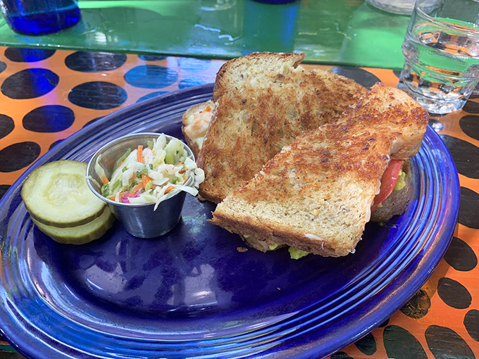 This isn't just a sandwich; it's architecture. Crispy exterior gives way to gooey interior in what might be the world's most perfect grilled cheese.