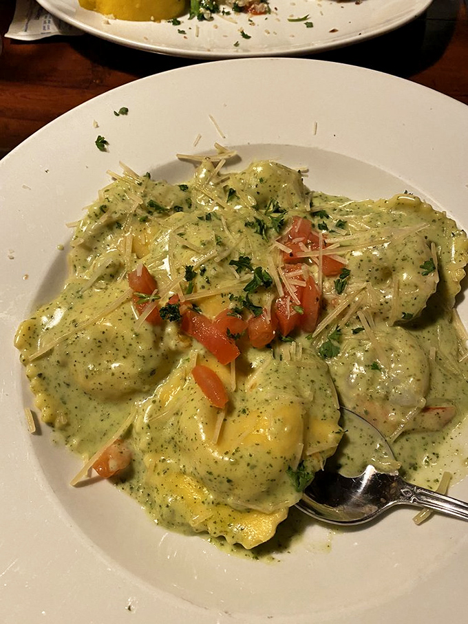 These ravioli aren't just swimming in pesto&mdash;they're doing the backstroke in a pool of herby, creamy indulgence that demands to be sopped up.