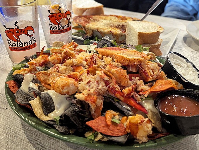 Lobster nachos that make you question everything you thought you knew about proper seafood etiquette. Worth every messy, delicious bite.