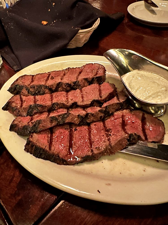 London Broil sliced with mathematical precision. Each piece promises a journey to beef nirvana with that perfect edge-to-center gradient of doneness.