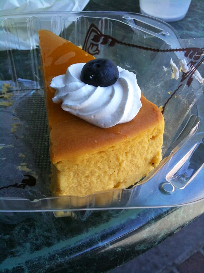Mango cheesecake that transports you to a tropical getaway with one bite. That dollop of whipped cream and blueberry? The beach umbrella in your dessert vacation.