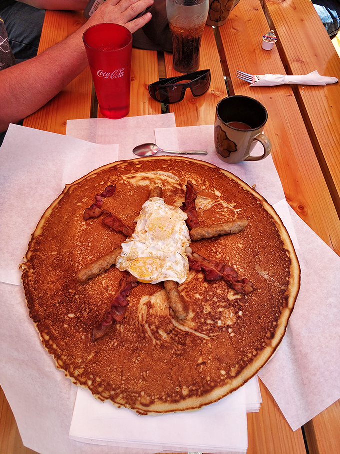 Pancake or edible frisbee? This magnificent disc of golden goodness could double as a life raft, topped with the perfect sunny-side egg.
