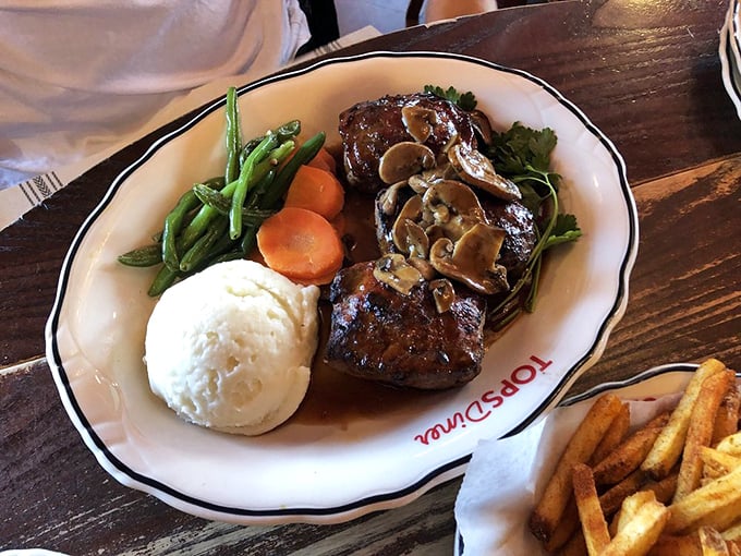 Meatloaf that would make your grandmother both jealous and proud, served with perfectly cooked vegetables and mashed potatoes like clouds.