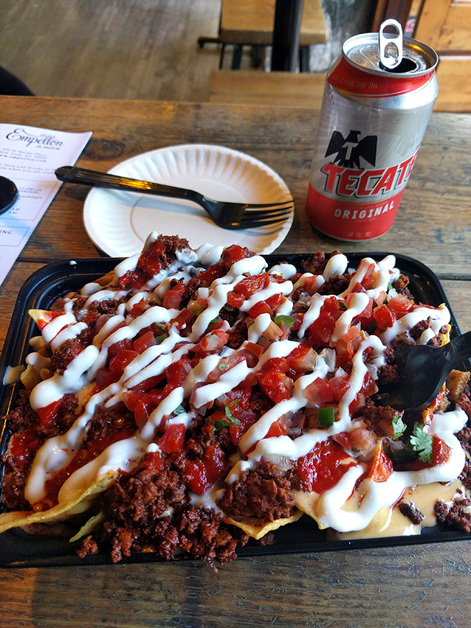 Meat lovers, rejoice! These nachos don't just have toppings&mdash;they have ambitions. That Tecate is about to witness something beautiful.