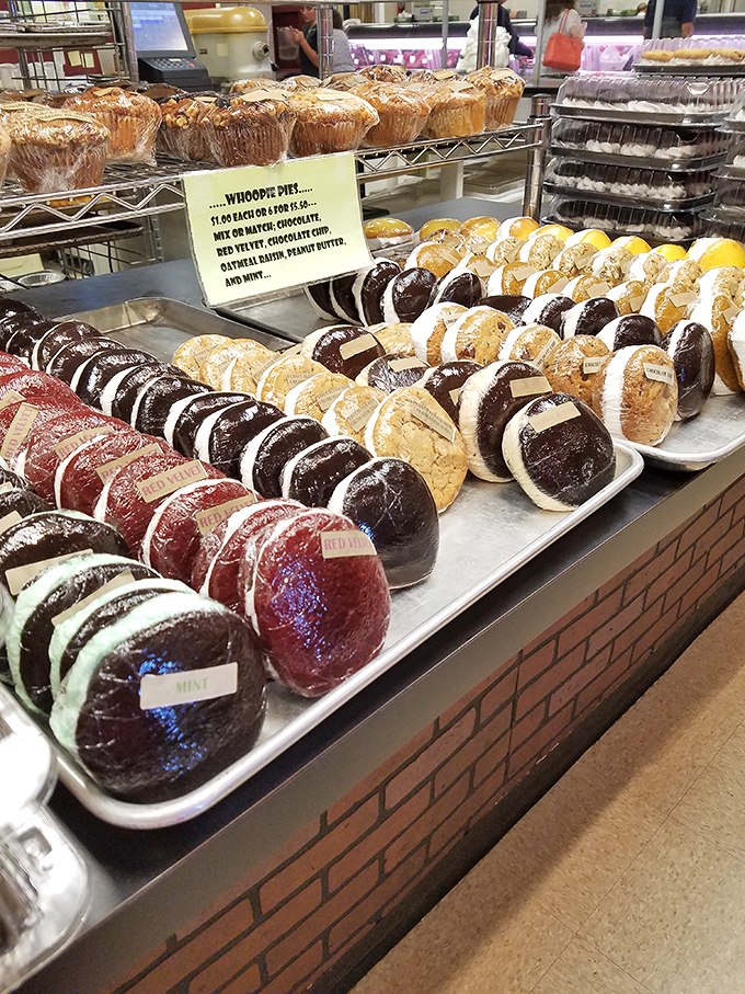Whoopie pies lined up like edible hockey pucks of joy. These cream-filled wonders are what Oreos dream of becoming when they grow up