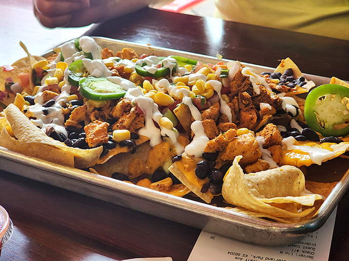 Architecture meets appetite. These nachos are constructed with the precision of Frank Lloyd Wright but with significantly more flavor and absolutely zero pretension.