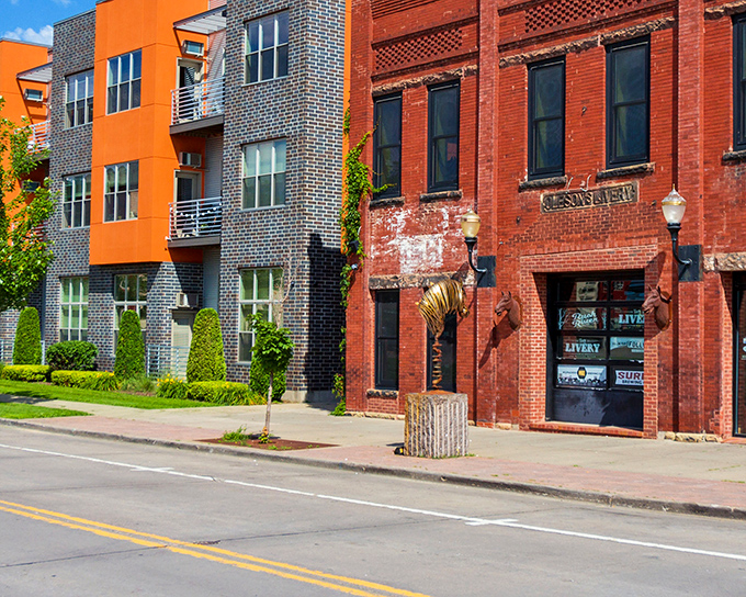 Old meets new in perfect harmony along this Eau Claire streetscape. That orange modern building isn't crashing the party&mdash;it's bringing fresh energy to the conversation.